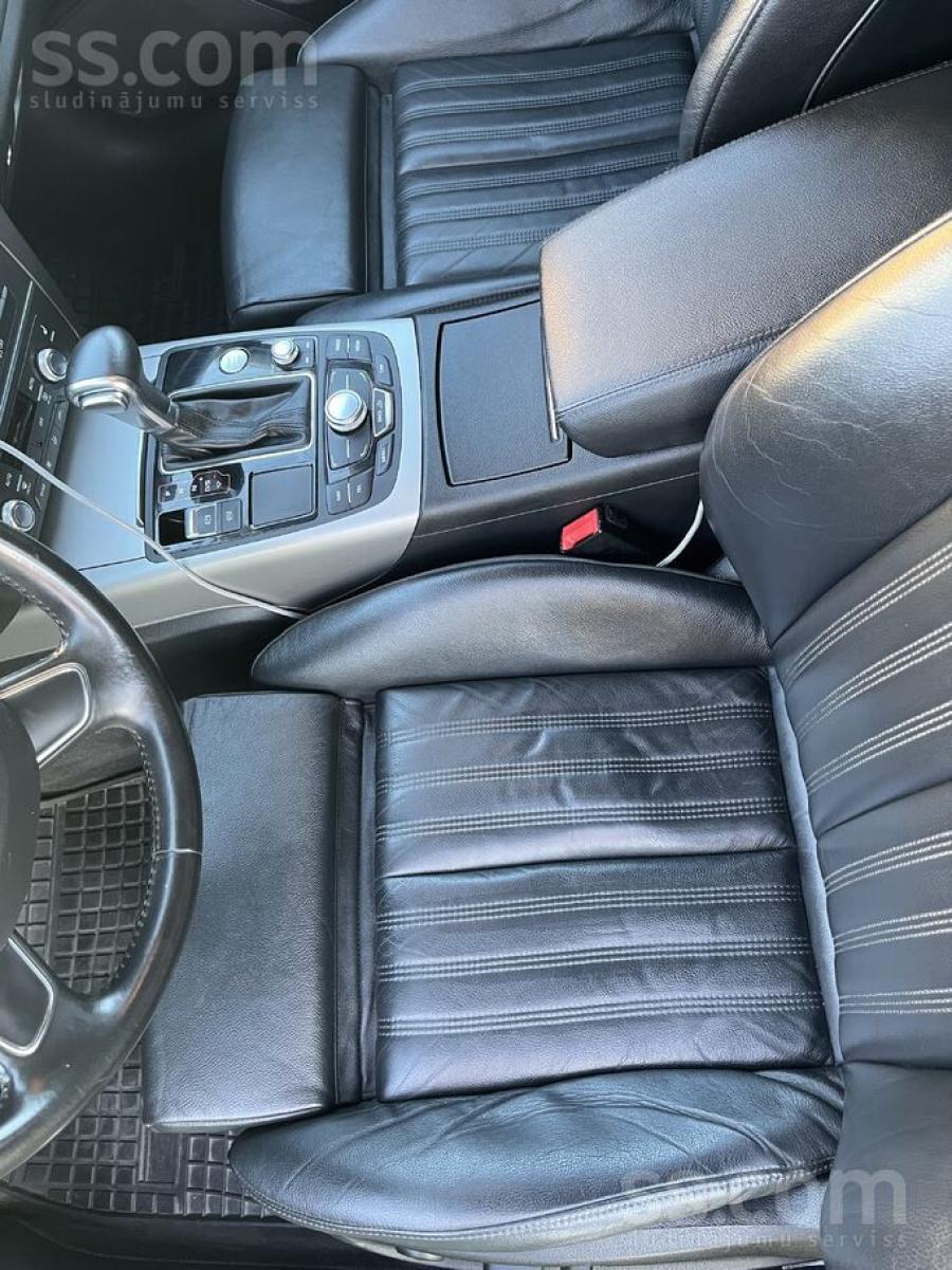 Black Audi A6 2012 in Riga, with an engine capacity of 3.00 L and mileage of 311 thousand km for 9200 €, photo 12 on AUTOMOTO.COM.LV