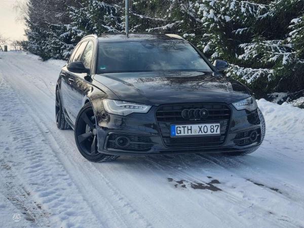 Black Audi A6 2013 in Vilnius, with an engine capacity of 2.97 L and mileage of 240 thousand km for 15699 €, photo 4 on AUTOMOTO.COM.LV