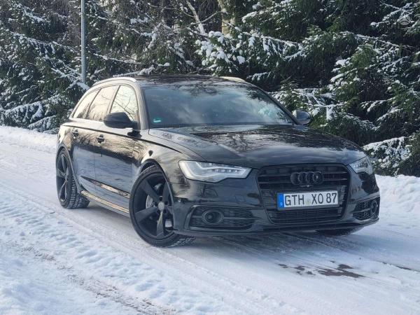Black Audi A6 2013 in Vilnius, with an engine capacity of 2.97 L and mileage of 240 thousand km for 15699 €, photo 5 on AUTOMOTO.COM.LV