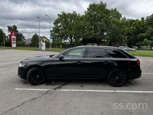 Black Audi A6 2013 in Riga, with an engine capacity of 2.00 L and mileage of 265 thousand km for 7500 €, photo 5 on AUTOMOTO.COM.LV
