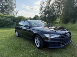 Black Audi A6 2013 in Utena, with an engine capacity of 3.00 L and mileage of 271 thousand km for 10500 €, photo 4 on AUTOMOTO.COM.LV