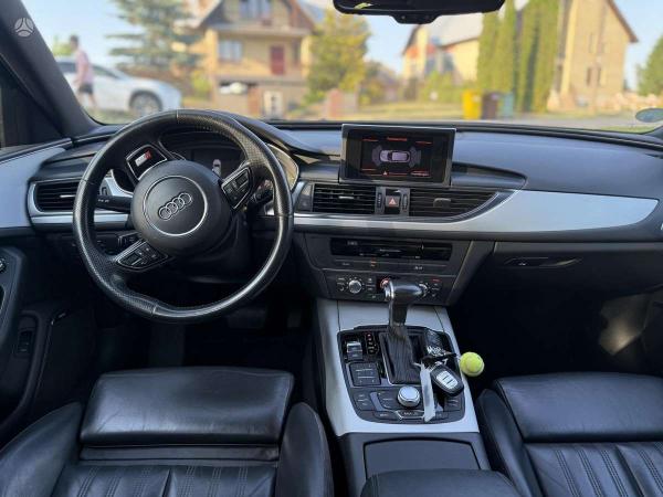 Black Audi A6 2013 in Utena, with an engine capacity of 2.97 L and mileage of 271 thousand km for 10700 €, photo 6 on AUTOMOTO.COM.LV