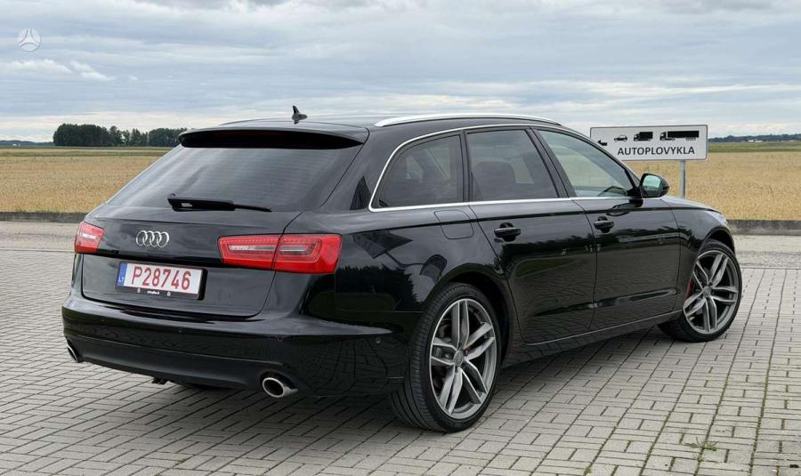 Black Audi A6 2013 in Raseiniai, with an engine capacity of 2.97 L and mileage of 272 thousand km for 9650 €, photo 4 on AUTOMOTO.COM.LV