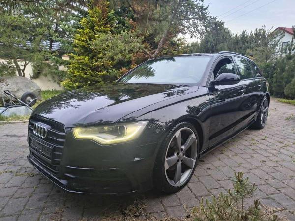 Black Audi A6 2013 in Kaunas, with an engine capacity of 2.97 L and mileage of 300 thousand km for 8400 €, photo 4 on AUTOMOTO.COM.LV