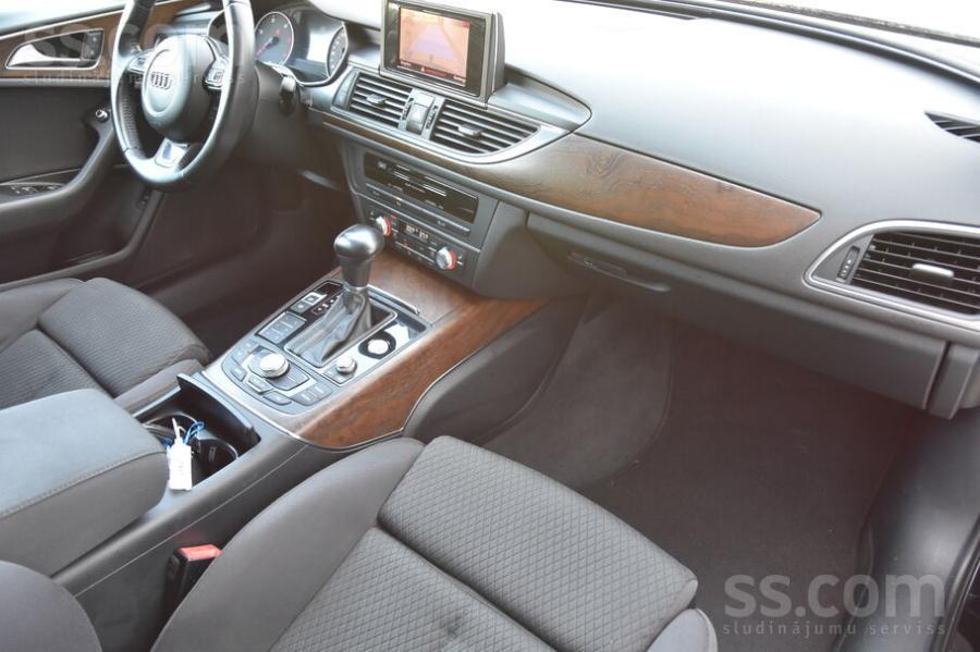Black Audi A6 2013 in Riga, with an engine capacity of 2.00 L and mileage of 299 thousand km for 8750 €, photo 12 on AUTOMOTO.COM.LV