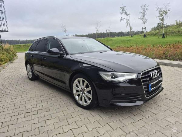 Audi A6 2013 in Vilnius on AUTOMOTO.COM.LV Black Audi A6 2013 in Vilnius, with an engine capacity of 2.97 L and mileage of 230 thousand km for 10000 €, photo 3 on AUTOMOTO.COM.LV