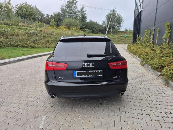 Audi A6 2013 in Vilnius on AUTOMOTO.COM.LV Black Audi A6 2013 in Vilnius, with an engine capacity of 2.97 L and mileage of 230 thousand km for 10000 €, photo 7 on AUTOMOTO.COM.LV