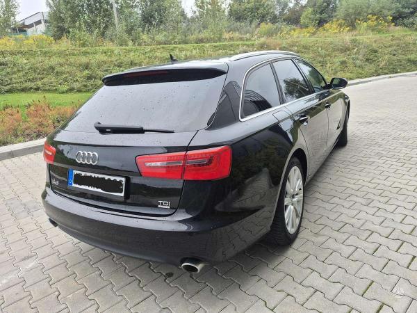 Audi A6 2013 in Vilnius on AUTOMOTO.COM.LV Black Audi A6 2013 in Vilnius, with an engine capacity of 2.97 L and mileage of 230 thousand km for 10000 €, photo 8 on AUTOMOTO.COM.LV