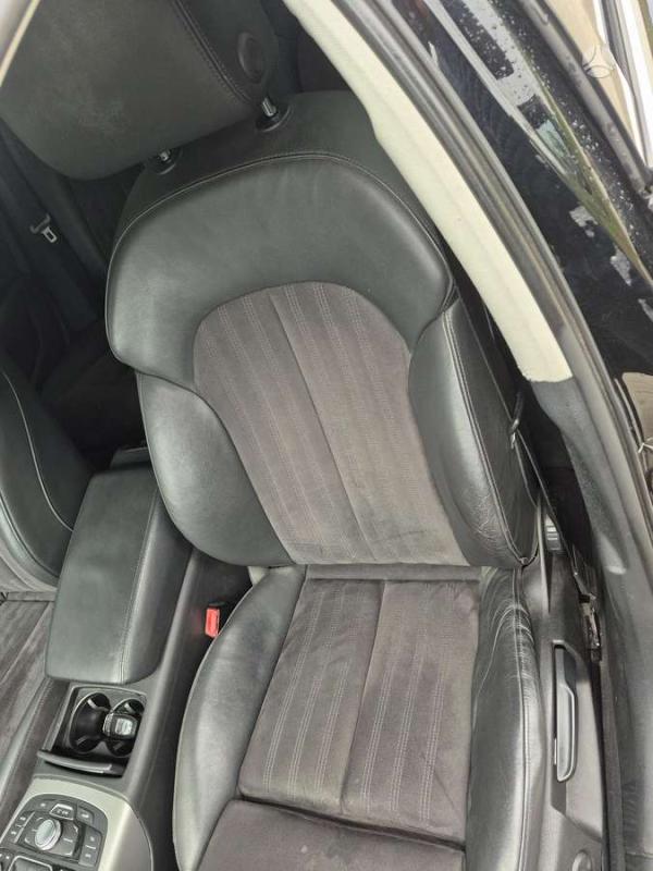 Audi A6 2013 in Vilnius on AUTOMOTO.COM.LV Black Audi A6 2013 in Vilnius, with an engine capacity of 2.97 L and mileage of 230 thousand km for 10000 €, photo 10 on AUTOMOTO.COM.LV