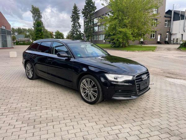 Audi A6 2013 in Marijampole on AUTOMOTO.COM.LV Black Audi A6 2013 in Marijampole, with an engine capacity of 1.97 L and mileage of 277 thousand km for 9200 €, photo 4 on AUTOMOTO.COM.LV