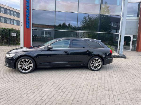 Audi A6 2013 in Marijampole on AUTOMOTO.COM.LV Black Audi A6 2013 in Marijampole, with an engine capacity of 1.97 L and mileage of 277 thousand km for 9200 €, photo 5 on AUTOMOTO.COM.LV