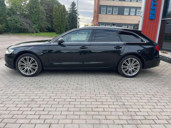 Audi A6 2013 in Marijampole on AUTOMOTO.COM.LV Black Audi A6 2013 in Marijampole, with an engine capacity of 1.97 L and mileage of 277 thousand km for 9200 €, photo 8 on AUTOMOTO.COM.LV