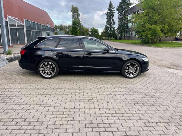 Audi A6 2013 in Marijampole on AUTOMOTO.COM.LV Black Audi A6 2013 in Marijampole, with an engine capacity of 1.97 L and mileage of 277 thousand km for 9200 €, photo 10 on AUTOMOTO.COM.LV