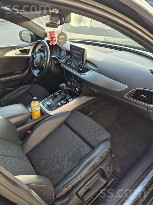 Melns Audi A6 2013 Daugavpils, ar dzinēja tilpumu 2.00 L un nobraukumu 330 tūkst. km par 11800 €, foto 4 vietnē AUTOMOTO.COM.LV