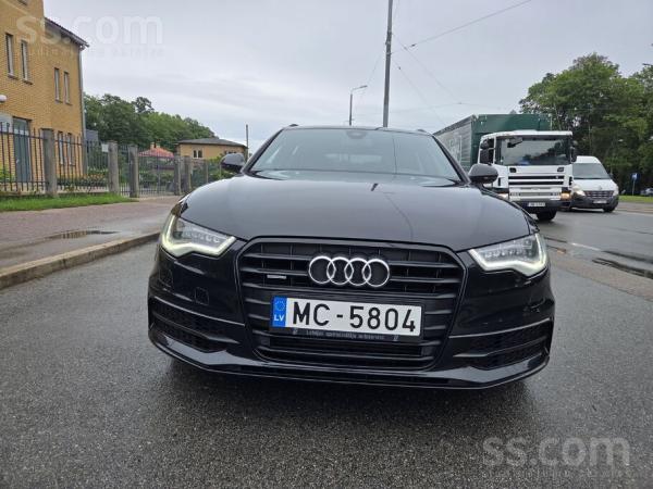 Black Audi A6 2013 in Riga, with an engine capacity of 3.00 L and mileage of 249 thousand km for 9500 €, photo 4 on AUTOMOTO.COM.LV