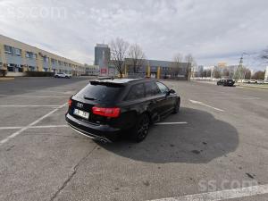 Black Audi A6 2014 in Riga, with an engine capacity of 3.00 L and mileage of 385 thousand km for 13600 €, photo 4 on AUTOMOTO.COM.LV