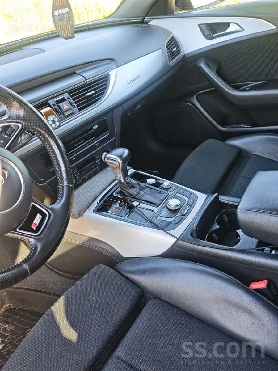 Black Audi A6 2014 in Riga, with an engine capacity of 3.00 L and mileage of 385 thousand km for 13600 €, photo 9 on AUTOMOTO.COM.LV