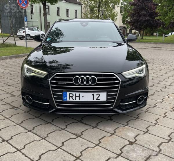 Black Audi A6 2014 in Riga, with an engine capacity of 3.00 L and mileage of 265 thousand km for 14500 €, photo 1 on AUTOMOTO.COM.LV