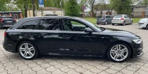 Black Audi A6 2014 in Riga, with an engine capacity of 3.00 L and mileage of 265 thousand km for 14500 €, photo 4 on AUTOMOTO.COM.LV