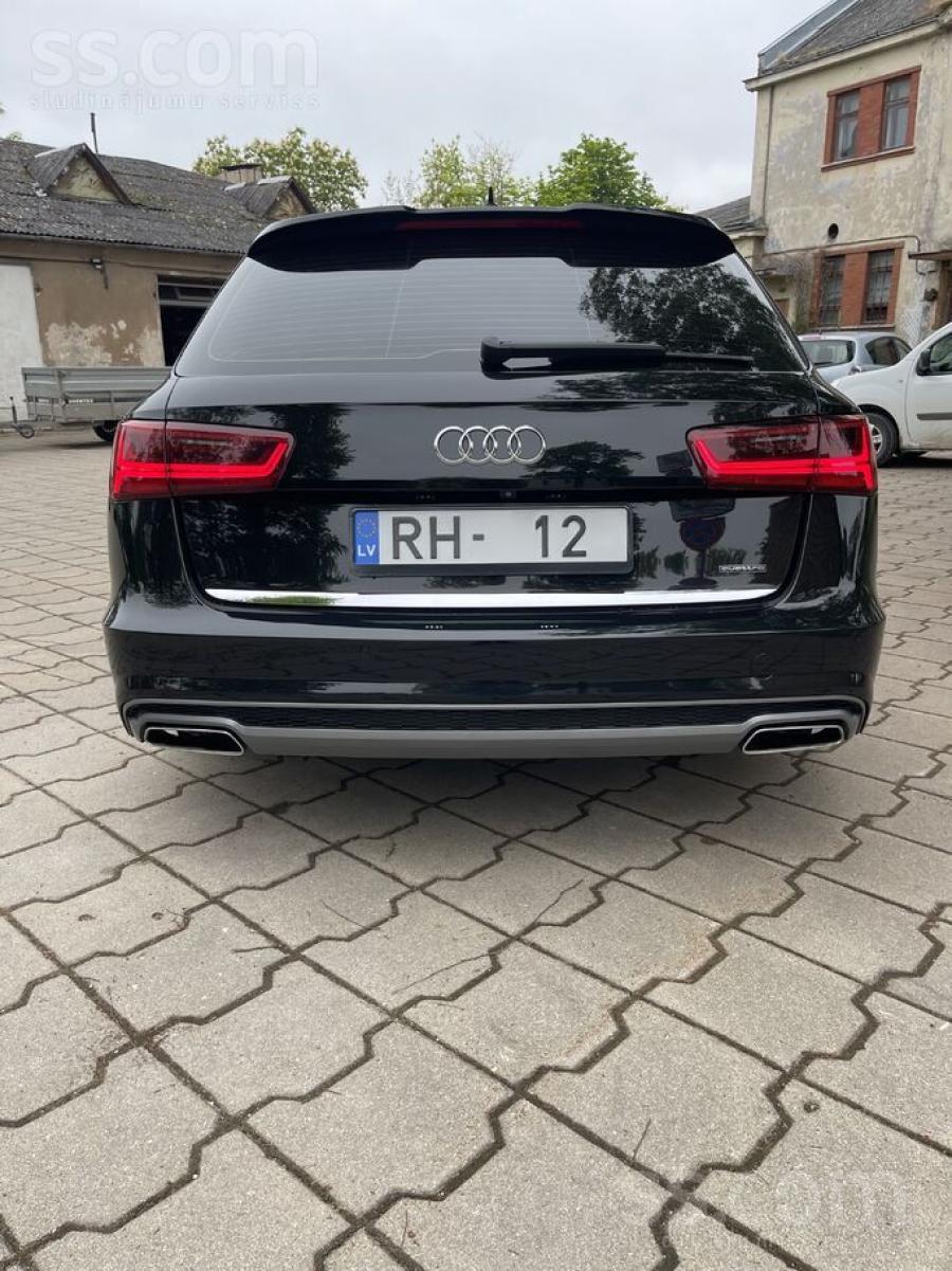 Black Audi A6 2014 in Riga, with an engine capacity of 3.00 L and mileage of 265 thousand km for 14500 €, photo 8 on AUTOMOTO.COM.LV