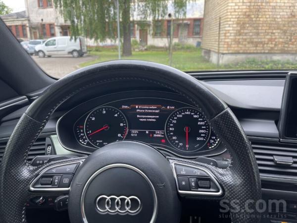 Black Audi A6 2014 in Riga, with an engine capacity of 3.00 L and mileage of 265 thousand km for 14500 €, photo 9 on AUTOMOTO.COM.LV