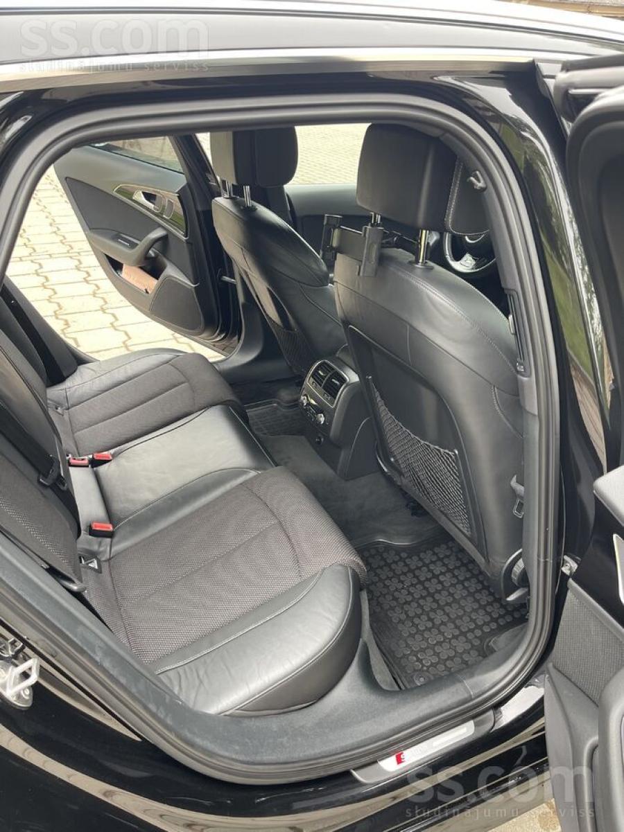 Black Audi A6 2014 in Riga, with an engine capacity of 3.00 L and mileage of 265 thousand km for 14500 €, photo 12 on AUTOMOTO.COM.LV