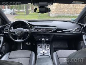 Black Audi A6 2014 in Riga, with an engine capacity of 3.00 L and mileage of 265 thousand km for 14500 €, photo 13 on AUTOMOTO.COM.LV