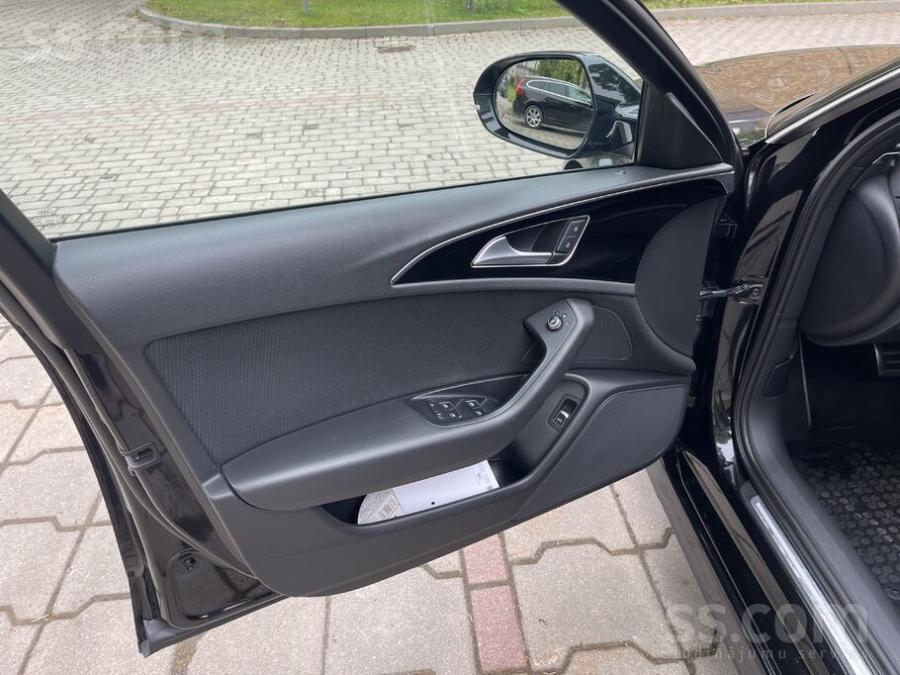 Black Audi A6 2014 in Riga, with an engine capacity of 3.00 L and mileage of 265 thousand km for 14500 €, photo 14 on AUTOMOTO.COM.LV