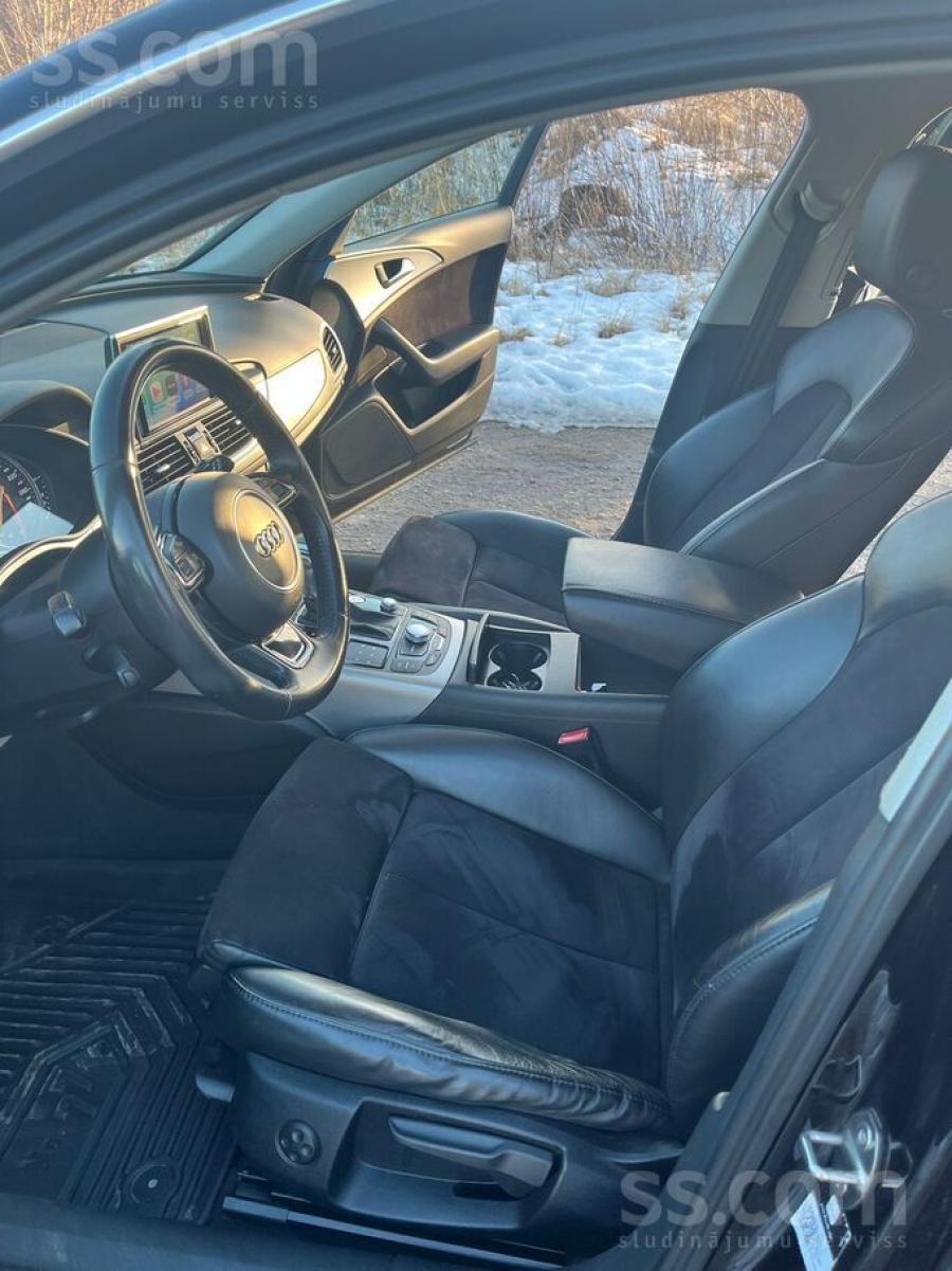Black Audi A6 2014 in Riga, with an engine capacity of 3.00 L and mileage of 347 thousand km for 7950 €, photo 9 on AUTOMOTO.COM.LV