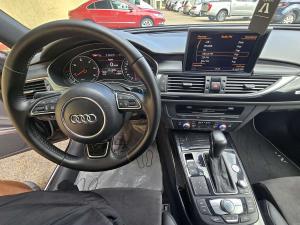 Black Audi A6 2014 in Taurage, with an engine capacity of 2.97 L and mileage of 237 thousand km for 16800 €, photo 11 on AUTOMOTO.COM.LV