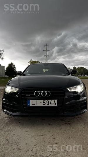 Black Audi A6 2014 in Riga, with an engine capacity of 3.00 L and mileage of 334 thousand km for 12200 €, photo 3 on AUTOMOTO.COM.LV