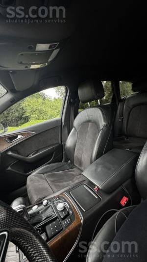 Black Audi A6 2014 in Riga, with an engine capacity of 3.00 L and mileage of 334 thousand km for 12200 €, photo 12 on AUTOMOTO.COM.LV