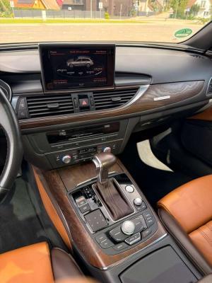Black Audi A6 2014 in Taurage, with an engine capacity of 2.97 L and mileage of 305 thousand km for 14300 €, photo 29 on AUTOMOTO.COM.LV