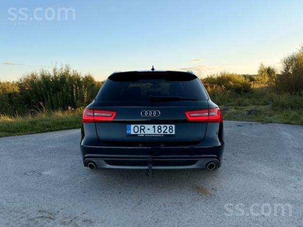 Black Audi A6 2014 in Riga, with an engine capacity of 3.00 L and mileage of 279 thousand km for 13600 €, photo 4 on AUTOMOTO.COM.LV