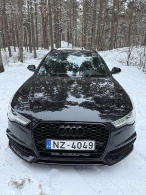 Black Audi A6 2015 in Riga, with an engine capacity of 3.00 L and mileage of 310 thousand km for 14900 €, photo 4 on AUTOMOTO.COM.LV