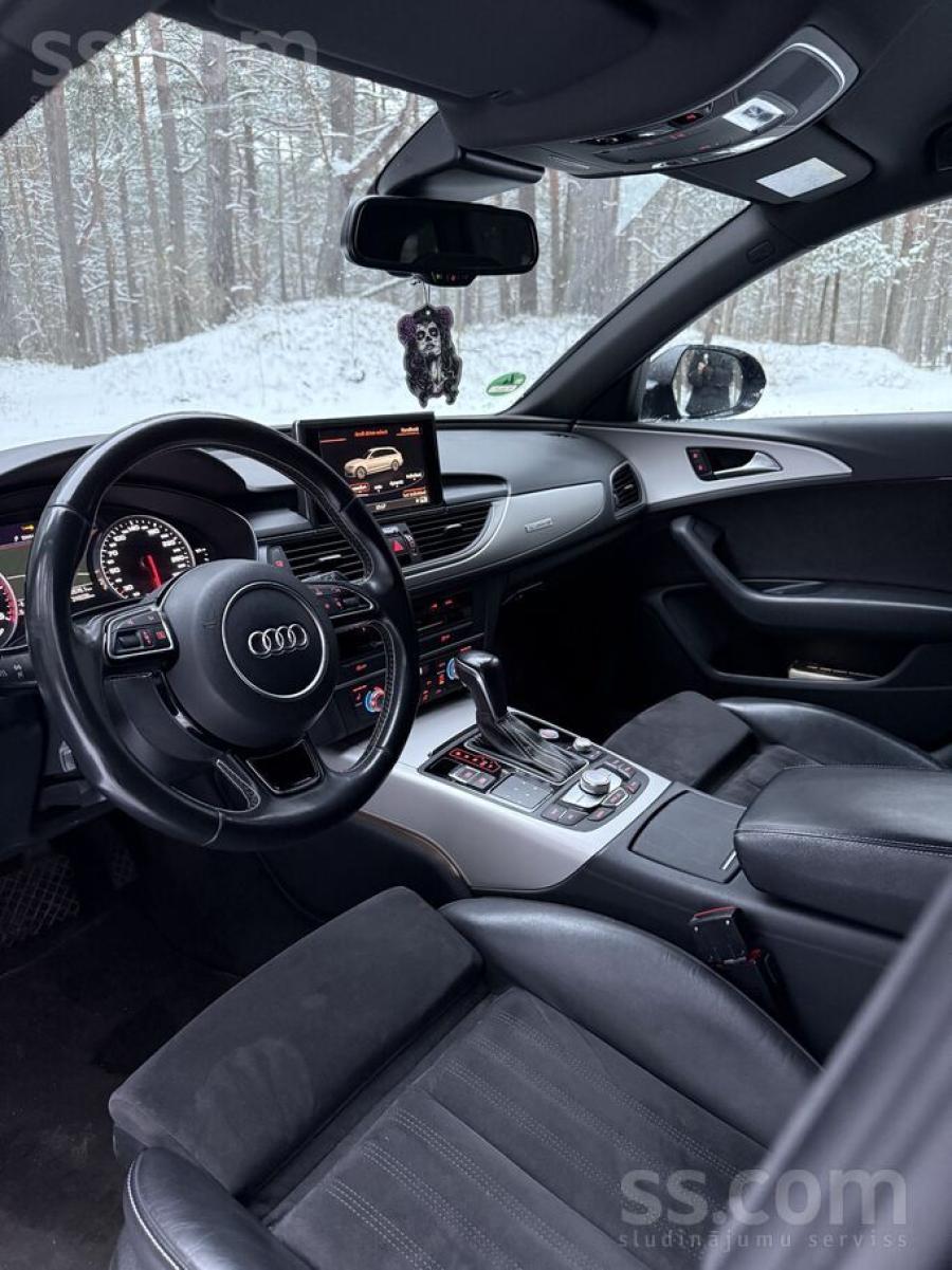 Black Audi A6 2015 in Riga, with an engine capacity of 3.00 L and mileage of 310 thousand km for 14900 €, photo 9 on AUTOMOTO.COM.LV