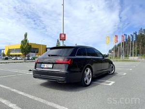 Black Audi A6 2015 in Riga, with an engine capacity of 3.00 L and mileage of 286 thousand km for 16990 €, photo 3 on AUTOMOTO.COM.LV
