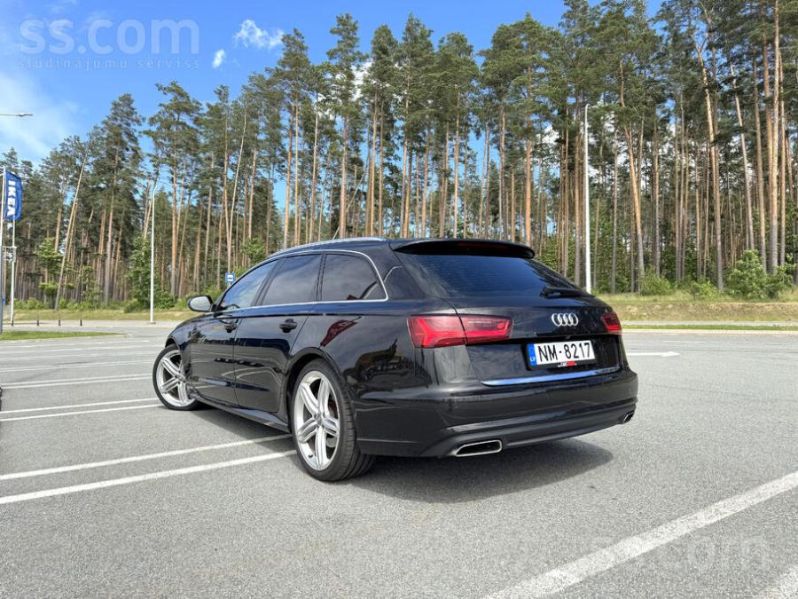 Black Audi A6 2015 in Riga, with an engine capacity of 3.00 L and mileage of 286 thousand km for 16990 €, photo 5 on AUTOMOTO.COM.LV