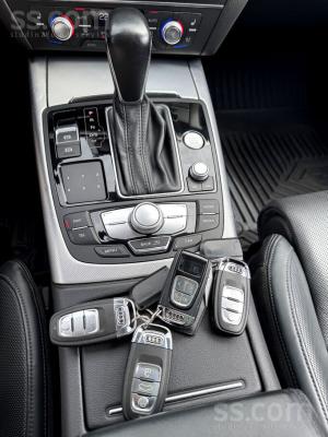 Black Audi A6 2015 in Riga, with an engine capacity of 3.00 L and mileage of 286 thousand km for 16990 €, photo 15 on AUTOMOTO.COM.LV