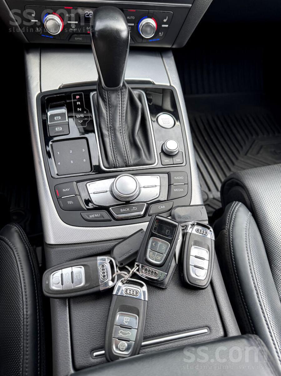 Black Audi A6 2015 in Riga, with an engine capacity of 3.00 L and mileage of 286 thousand km for 16990 €, photo 15 on AUTOMOTO.COM.LV