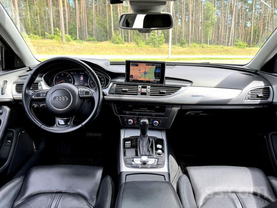 Black Audi A6 2015 in Riga, with an engine capacity of 3.00 L and mileage of 286 thousand km for 16990 €, photo 16 on AUTOMOTO.COM.LV