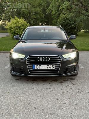 Black Audi A6 2015 in Riga, with an engine capacity of 3.00 L and mileage of 246 thousand km for 12500 €, photo 4 on AUTOMOTO.COM.LV