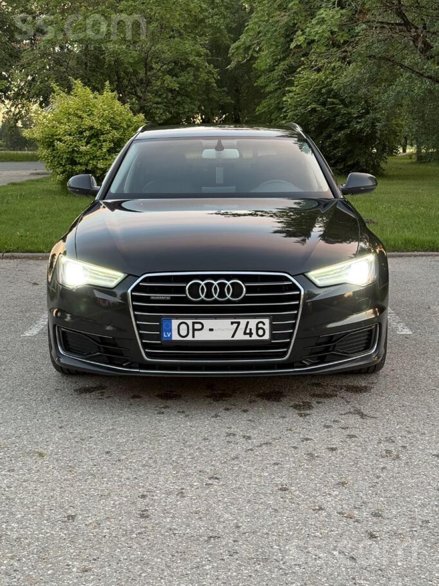 Black Audi A6 2015 in Riga, with an engine capacity of 3.00 L and mileage of 246 thousand km for 12500 €, photo 4 on AUTOMOTO.COM.LV