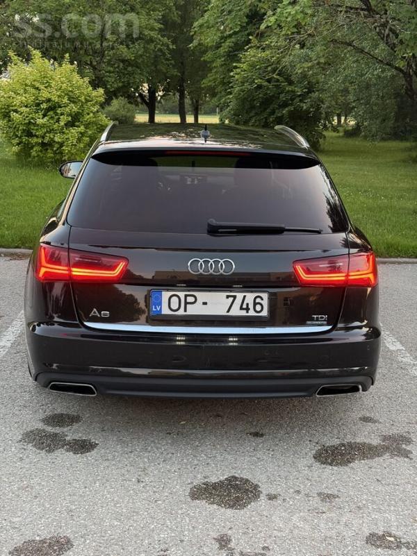 Black Audi A6 2015 in Riga, with an engine capacity of 3.00 L and mileage of 246 thousand km for 12500 €, photo 4 on AUTOMOTO.COM.LV