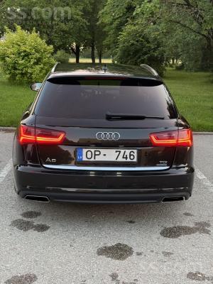 Black Audi A6 2015 in Riga, with an engine capacity of 3.00 L and mileage of 246 thousand km for 12500 €, photo 5 on AUTOMOTO.COM.LV