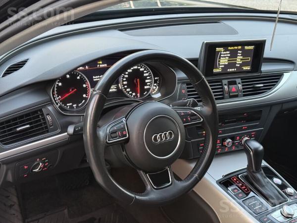 Black Audi A6 2015 in Riga, with an engine capacity of 3.00 L and mileage of 246 thousand km for 12500 €, photo 5 on AUTOMOTO.COM.LV