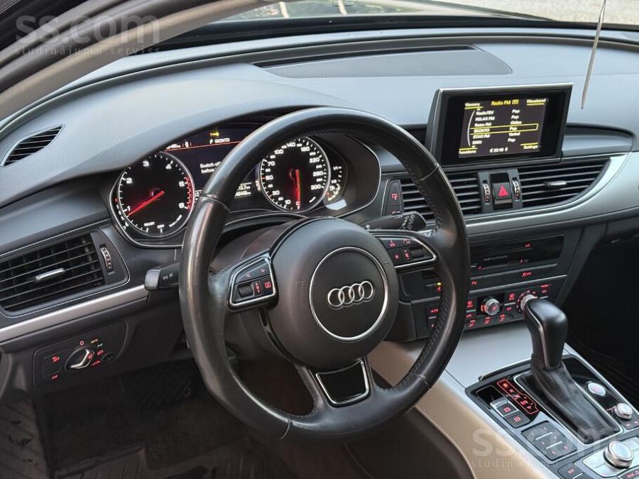 Black Audi A6 2015 in Riga, with an engine capacity of 3.00 L and mileage of 246 thousand km for 12500 €, photo 6 on AUTOMOTO.COM.LV