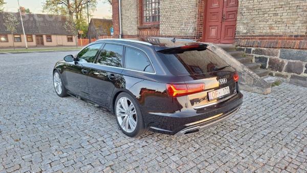 Black Audi A6 2015 in Riga, with an engine capacity of 3.00 L and mileage of 197 thousand km for 15000 €, photo 4 on AUTOMOTO.COM.LV