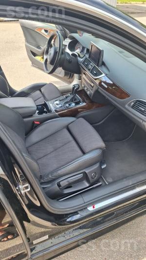 Black Audi A6 2015 in Riga, with an engine capacity of 3.00 L and mileage of 197 thousand km for 15000 €, photo 25 on AUTOMOTO.COM.LV