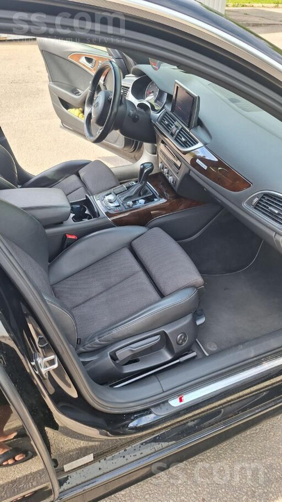 Black Audi A6 2015 in Riga, with an engine capacity of 3.00 L and mileage of 197 thousand km for 15000 €, photo 25 on AUTOMOTO.COM.LV